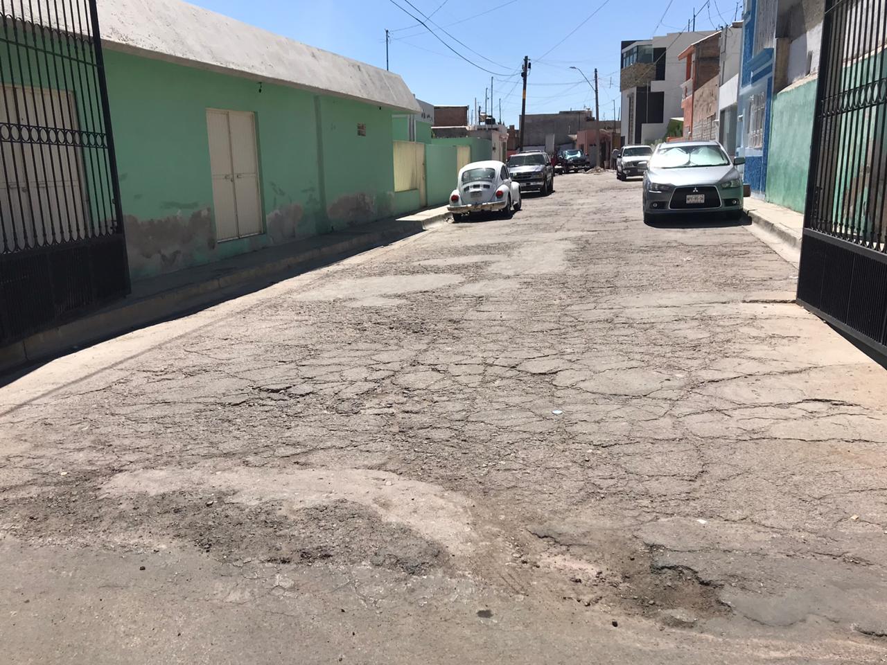Crecen baches sobre calles del barrio de Tierra Blanca | Telediario México